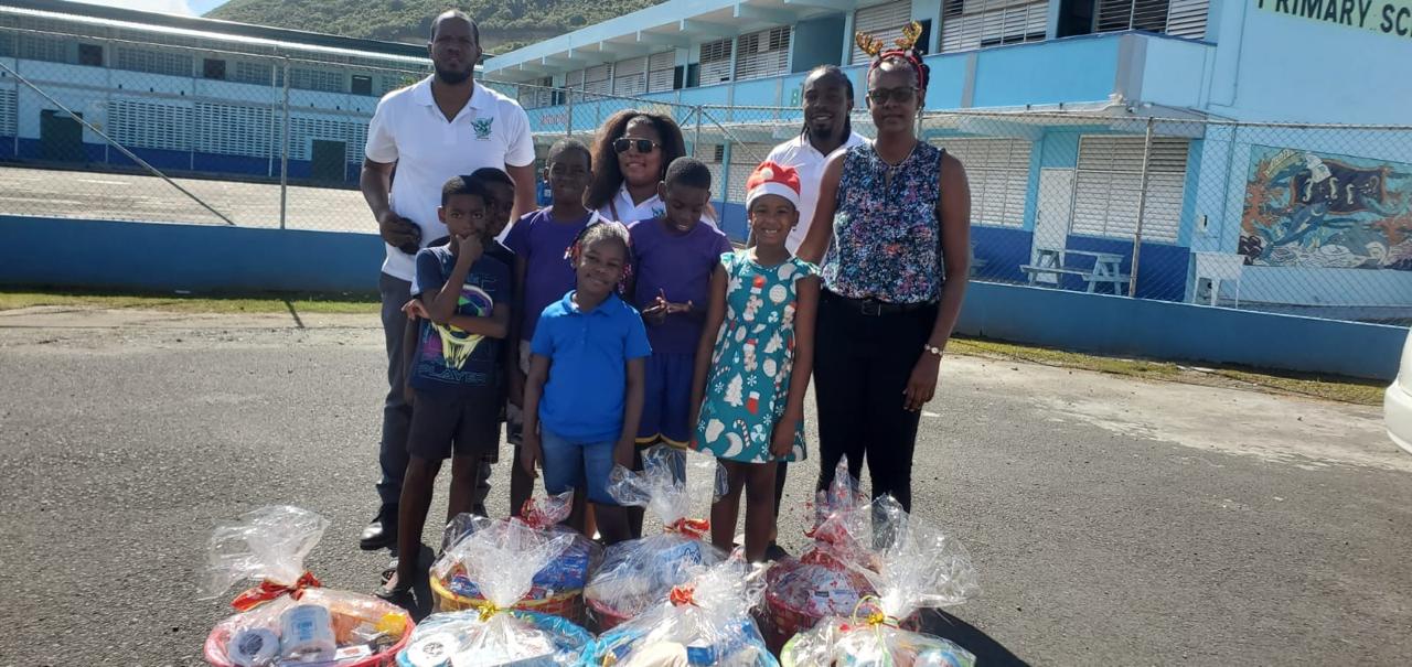 Dennery Falcons Athletics Club spreads Christmas cheer with hampers - St. Lucia Times